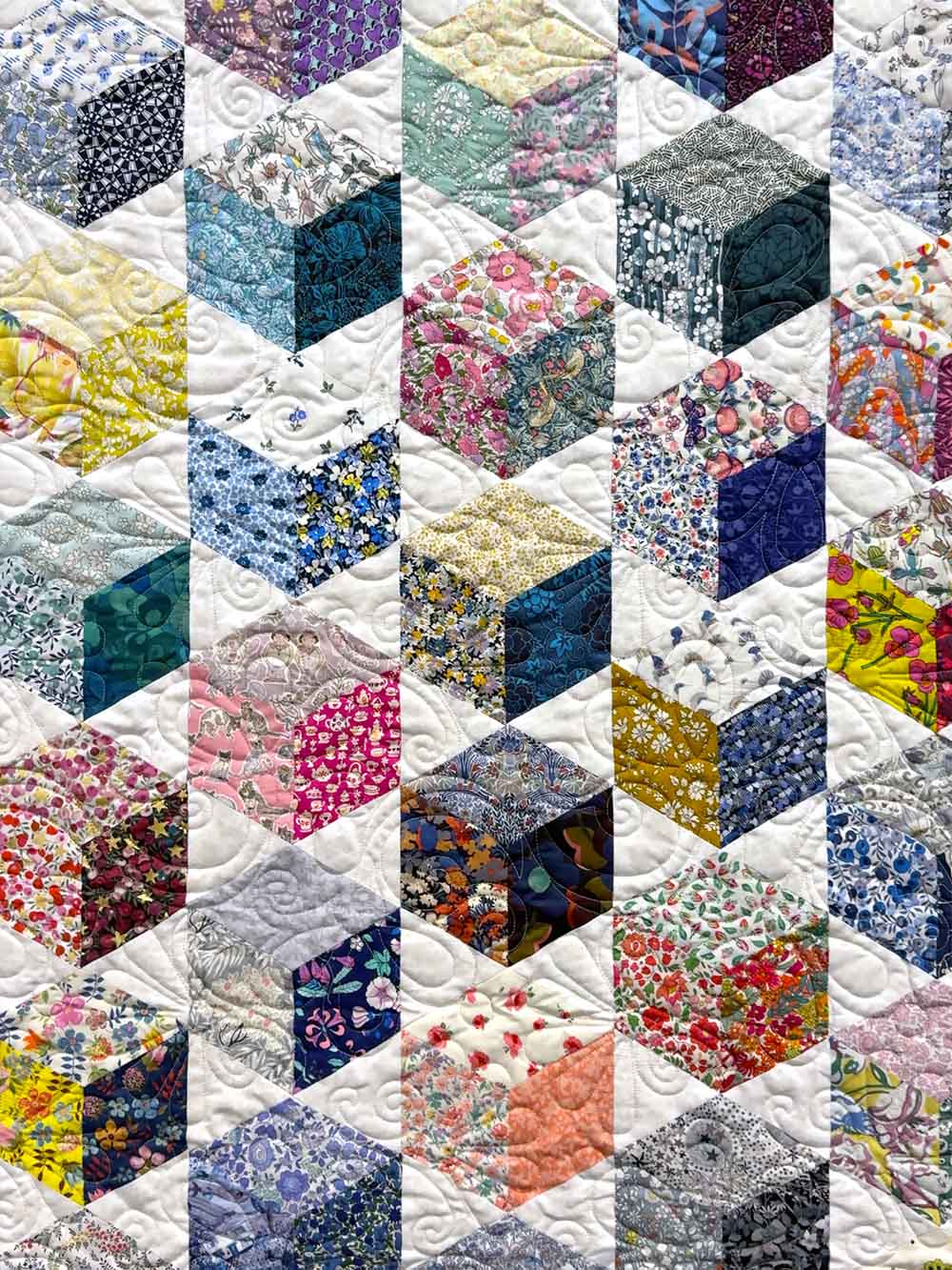 The Tumbling Blocks Quilt - Alice Caroline